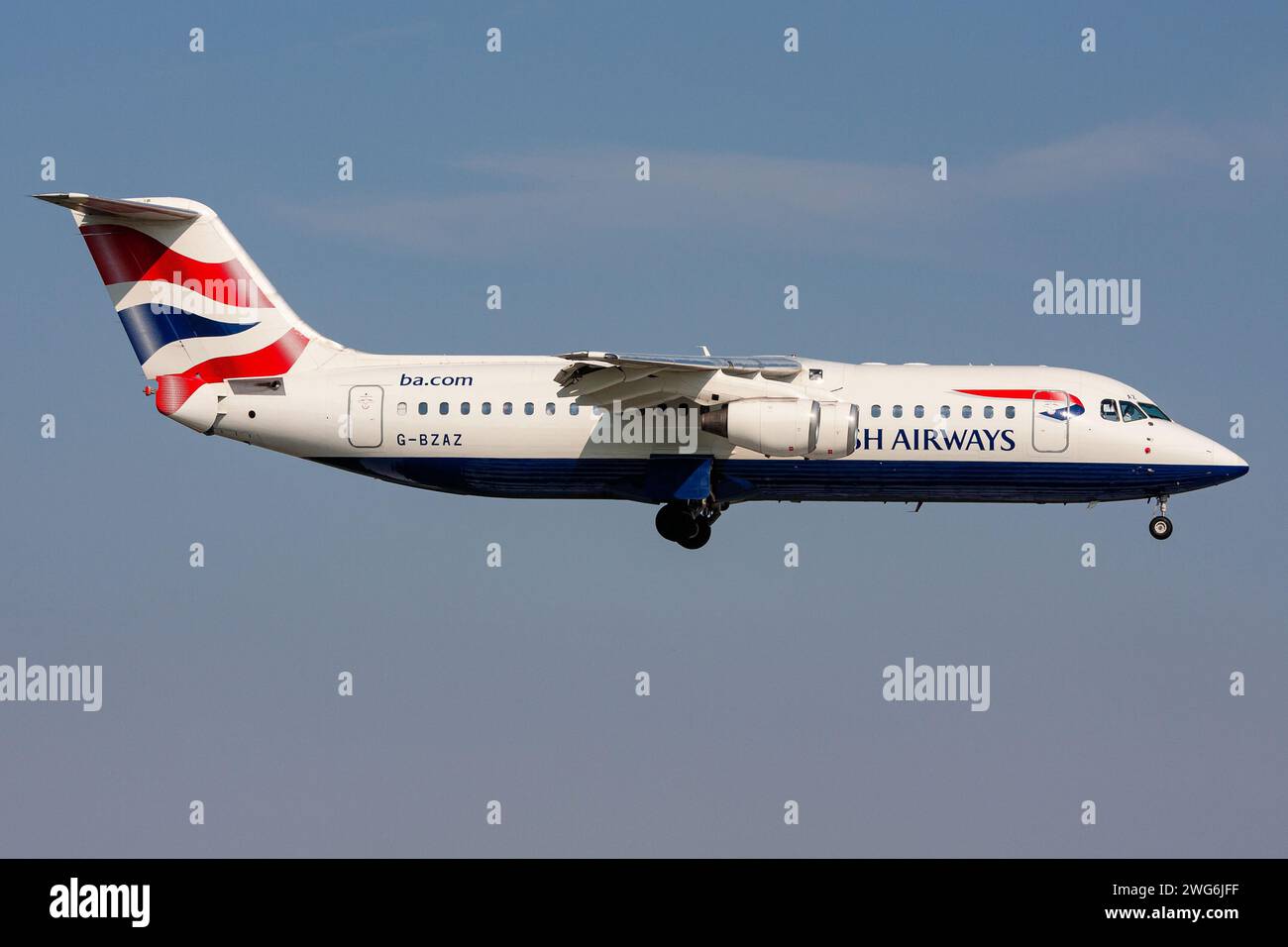 British Airways BAe Avro RJ-100 with registration G-BZAZ on final for ...