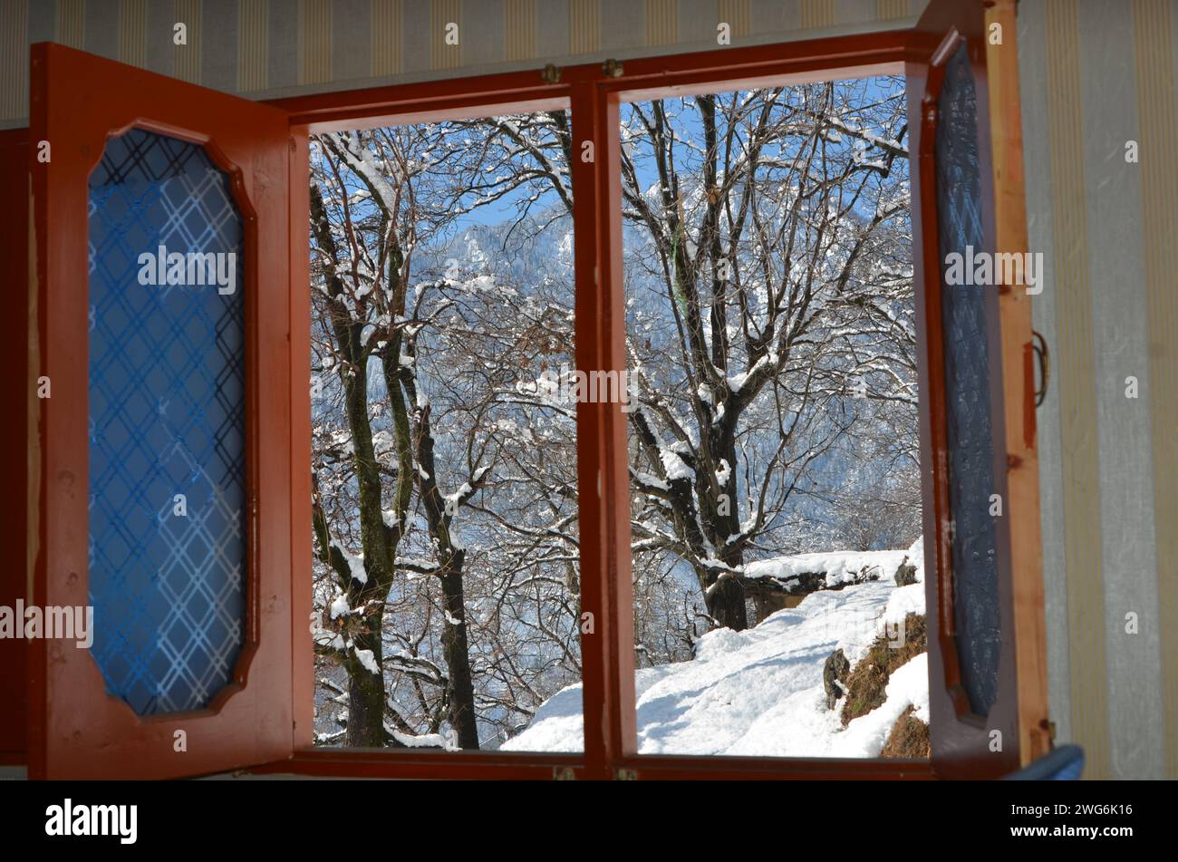 Window outside snowfalls beautiful scene Stock Photo - Alamy