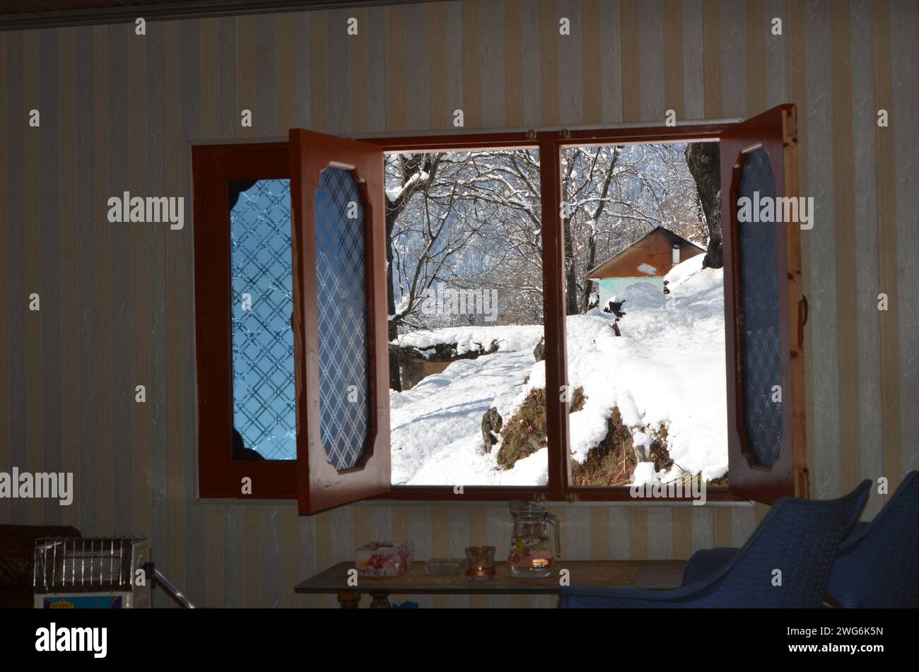 Window outside snowfalls beautiful scene Stock Photo - Alamy