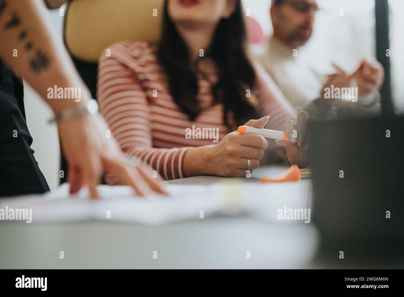 Team members collaborating in business hi-res stock photography and ...