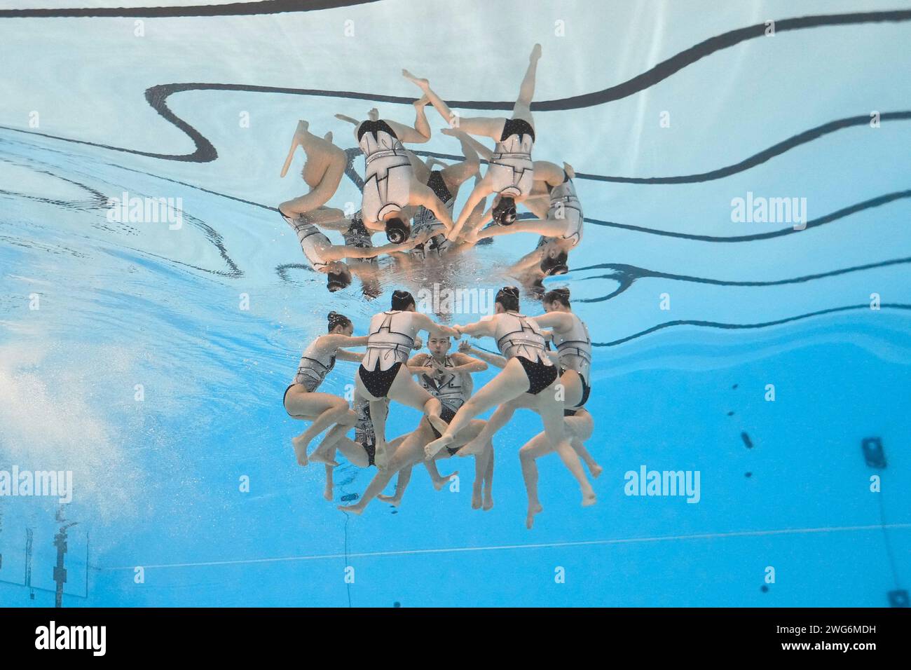 Macau team compete in the mixed team acrobatic of artistic swimming at ...