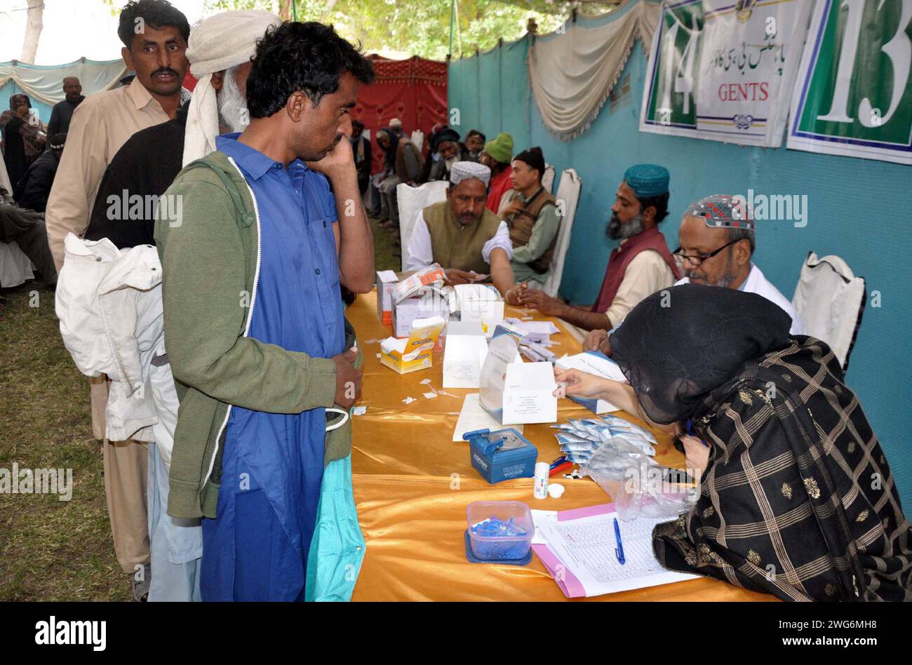 Patients are being examine by doctors during free eye medical camp ...