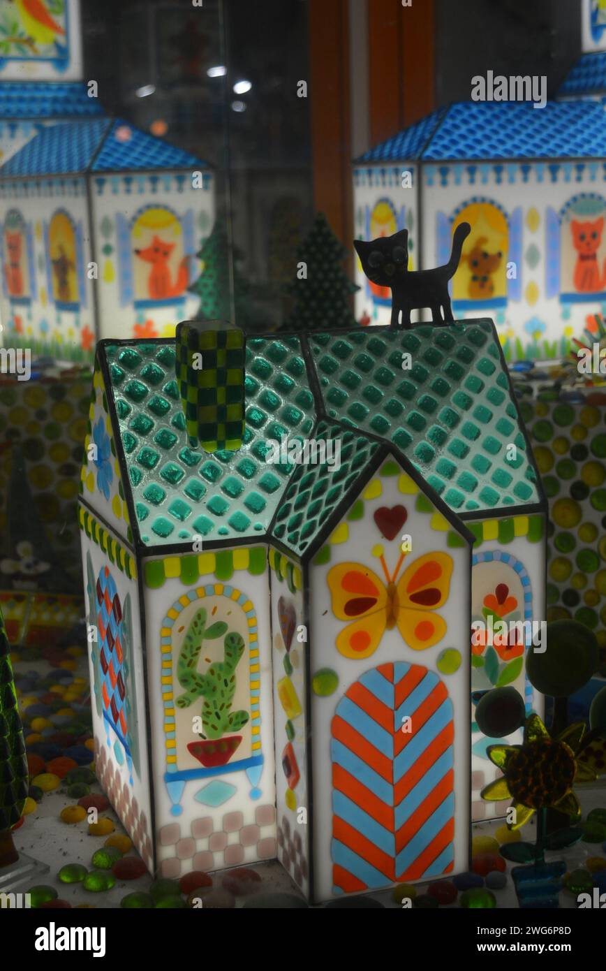 Glowing caramel houses and caramel figurines of the cityscape with ...