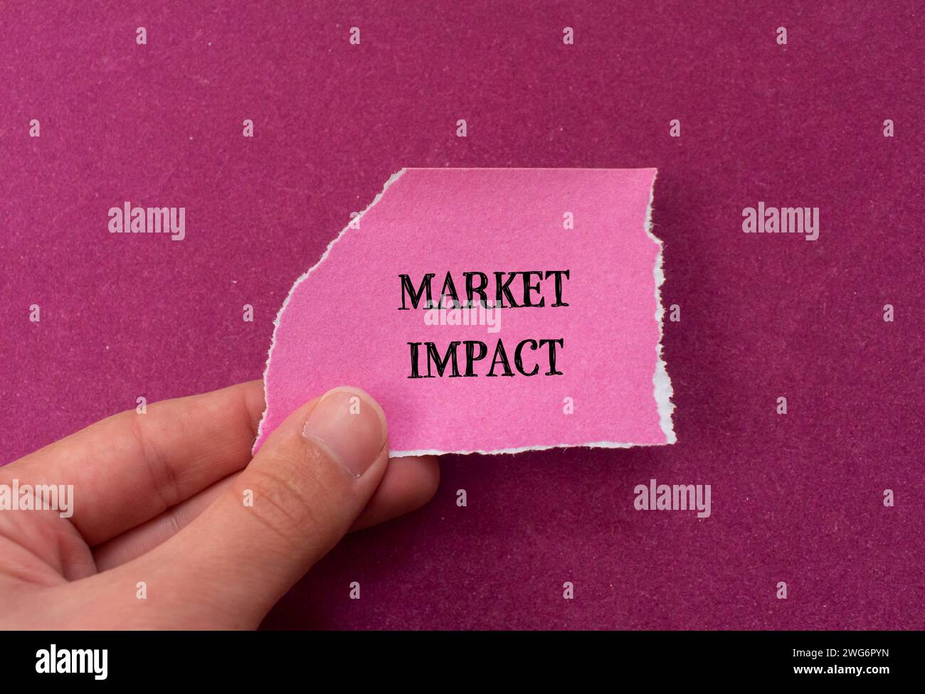 Market impact lettering on ripped paper with purple background ...