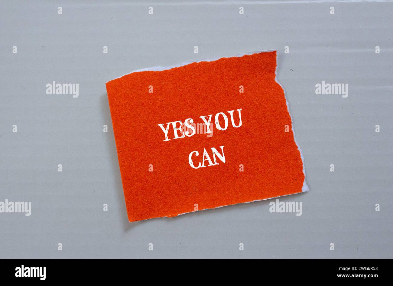 Yes you can lettering on ripped paper. Conceptual symbol. Top view ...