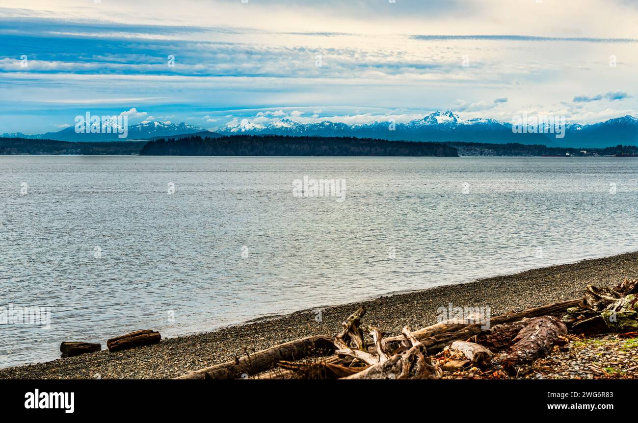 A landscape photo of the Olympic Mountain Range across the Puget Sound ...