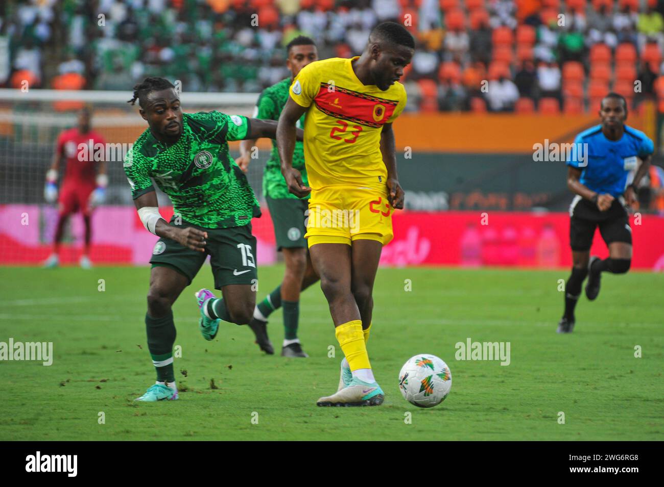 ABIDJAN, COTE D'IVOiRE - FEBRUARY 2; Simon Moses of Nigeria and Manuel Luis Da Silva Cafumana of ...