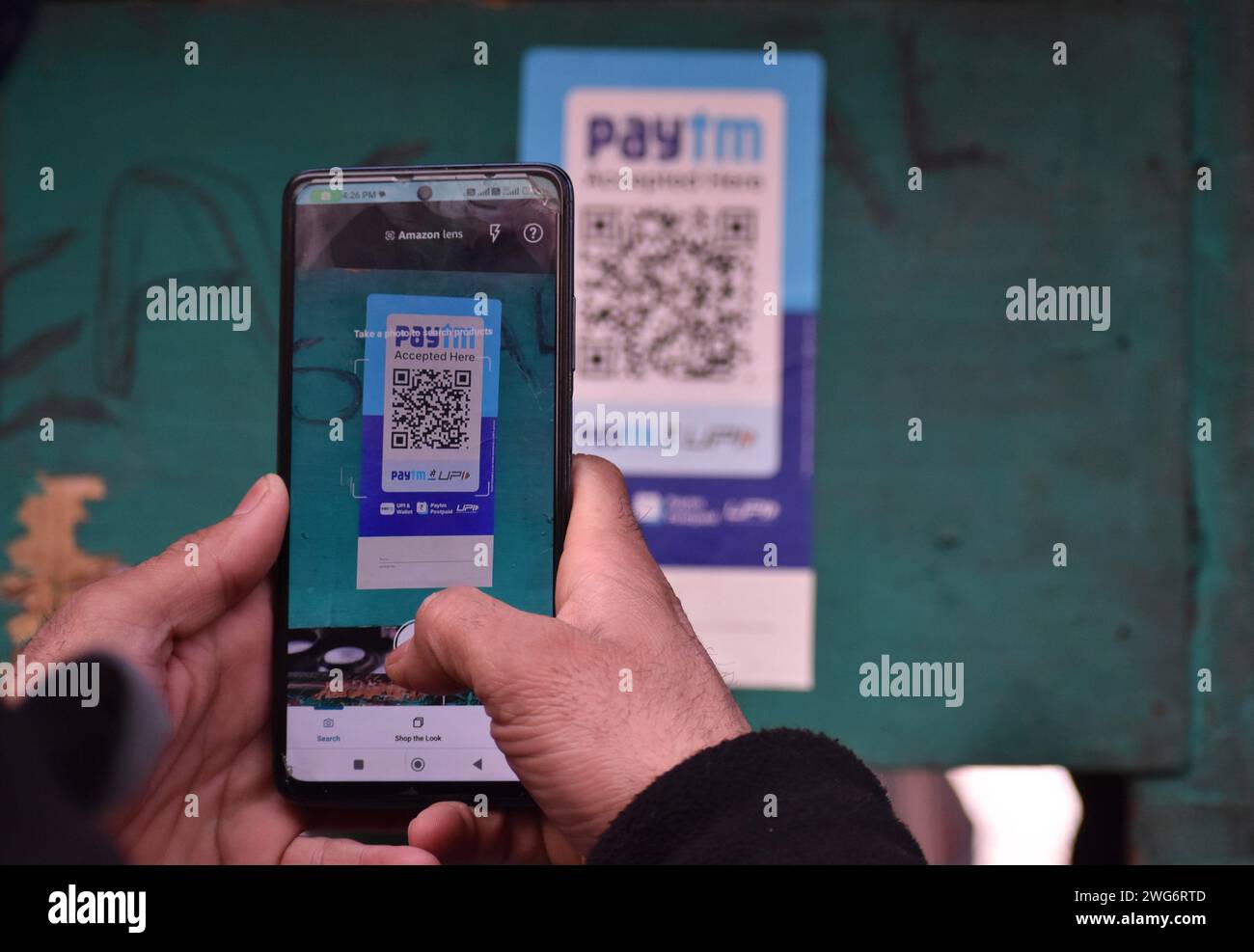 Non Exclusive: February 02,2024, Srinagar, India : A man scans the QR ...