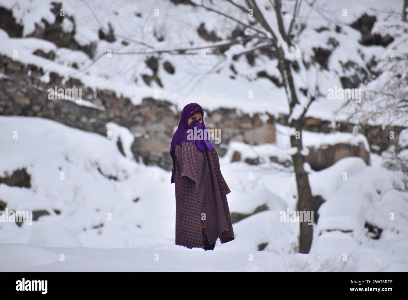 Non Exclusive: February 02,2024, Srinagar, India : A man walks on a ...