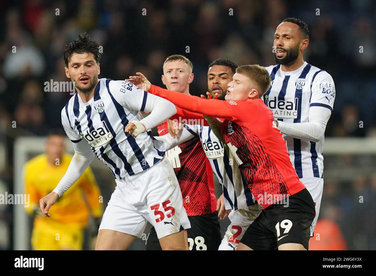 Tempers fray between West Bromwich Albion's Okay Yokuslu (left) and ...