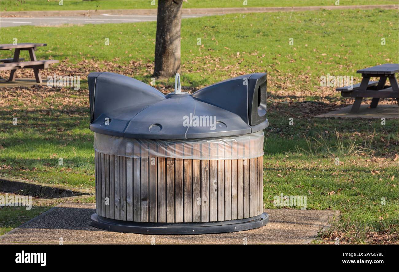 Over sized recycling bin made of wooden slats in an aire in France ...