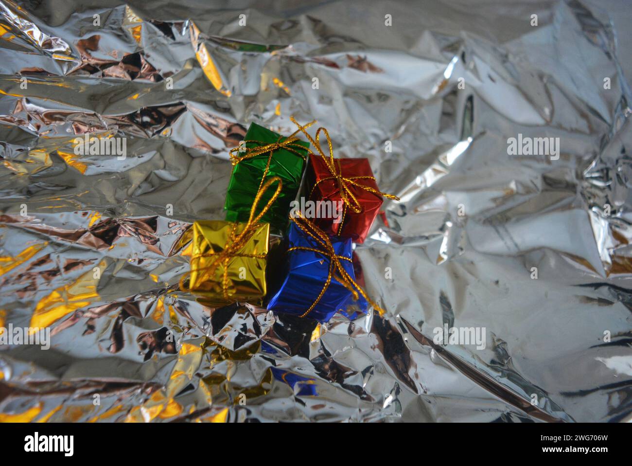 Beautiful multi-colored four packaged gifts for the holidays and the ...