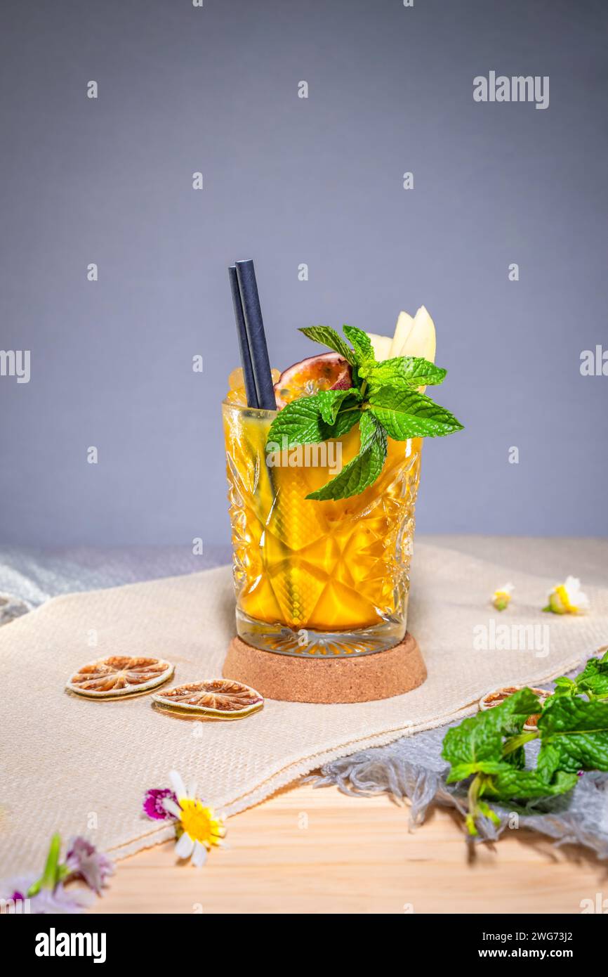 A glass of Brazilian passion fruit cocktail with fresh mint Stock Photo ...