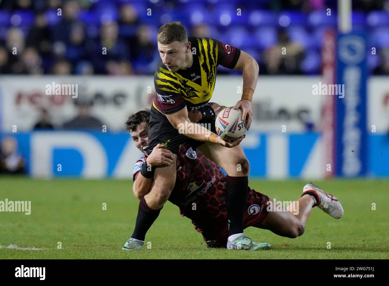 Warrington, UK. 03rd Feb, 2024. Kai O'Donnell of Leigh Leopards tackles ...