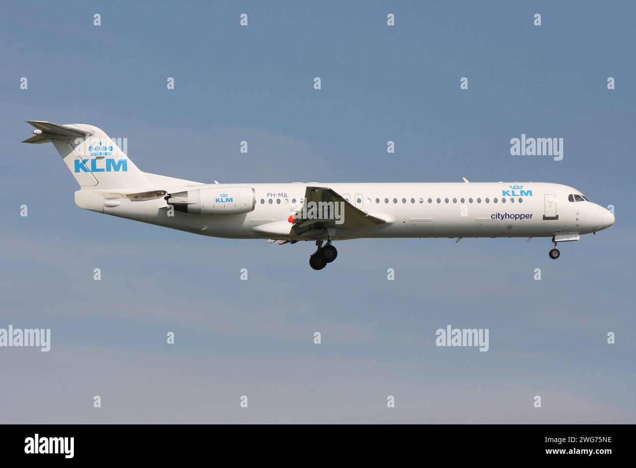 Dutch KLM Cityhopper Fokker 100 with registration PH-MJL in basic white ...