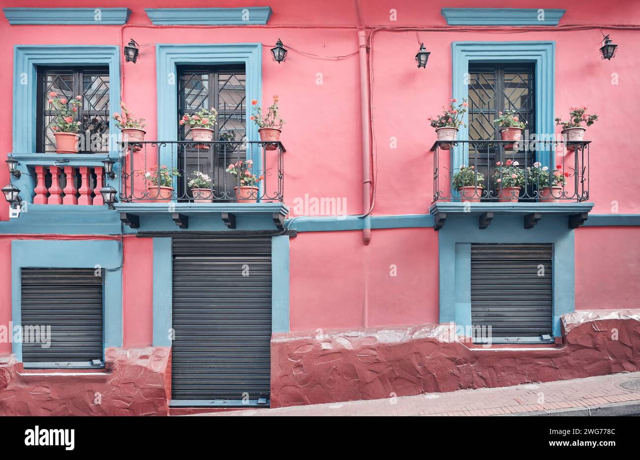 Street view of the facade of an old colonial building, Quito, Ecuador ...