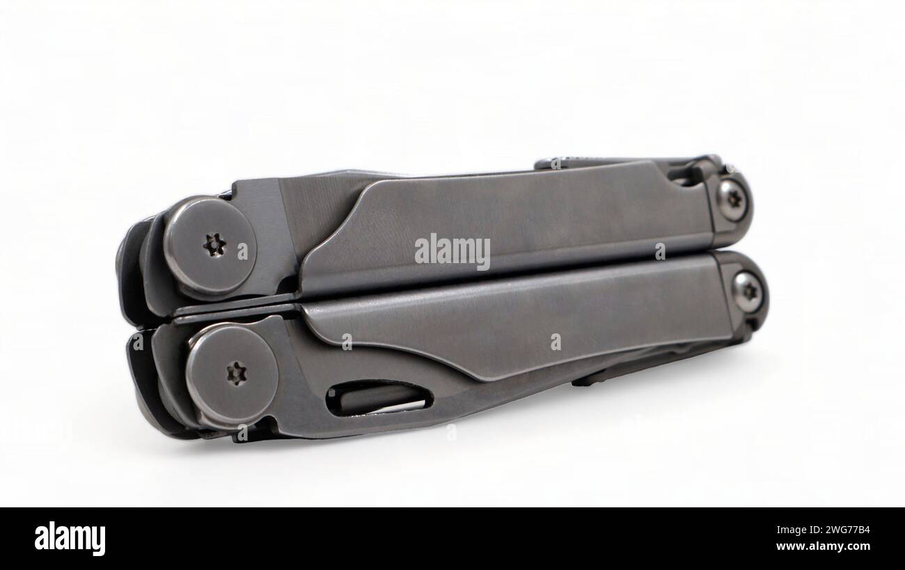 Folded steel multitool isolated on white background. A tool for daily ...