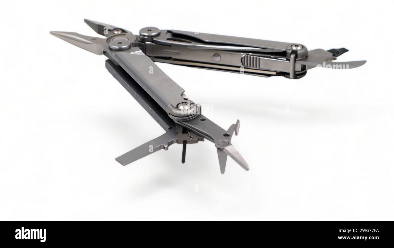 Opened modern steel multitool with pliers, file, blade, screwdriver ...