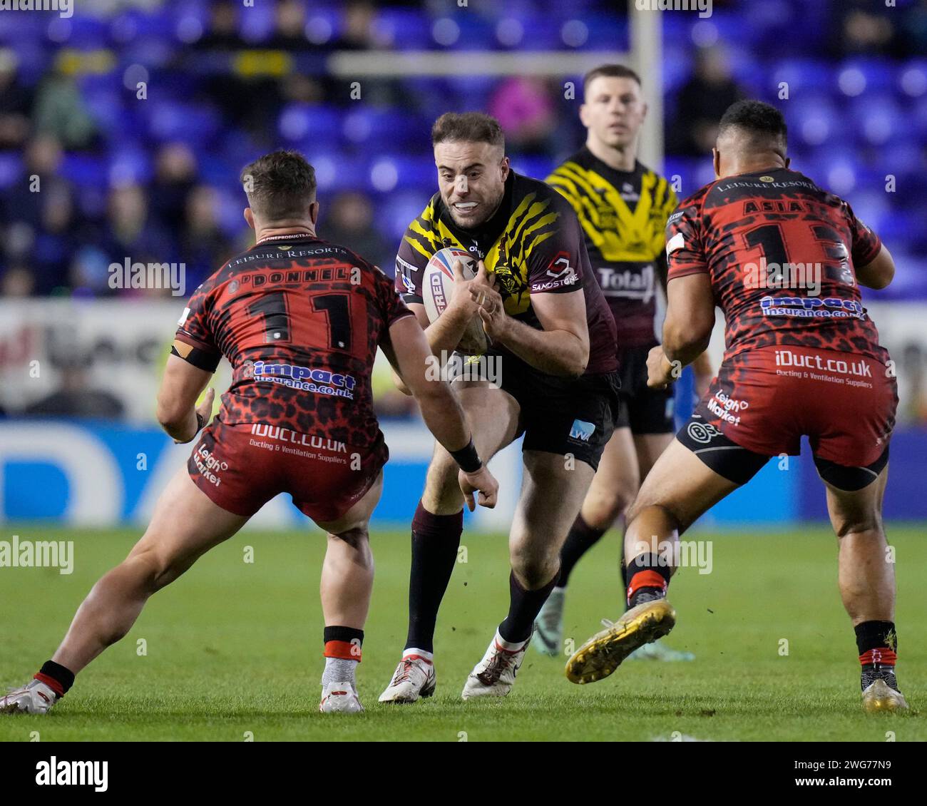 James Harrison of Warrington Wolves runs at Kai O’Donnell of Leigh ...