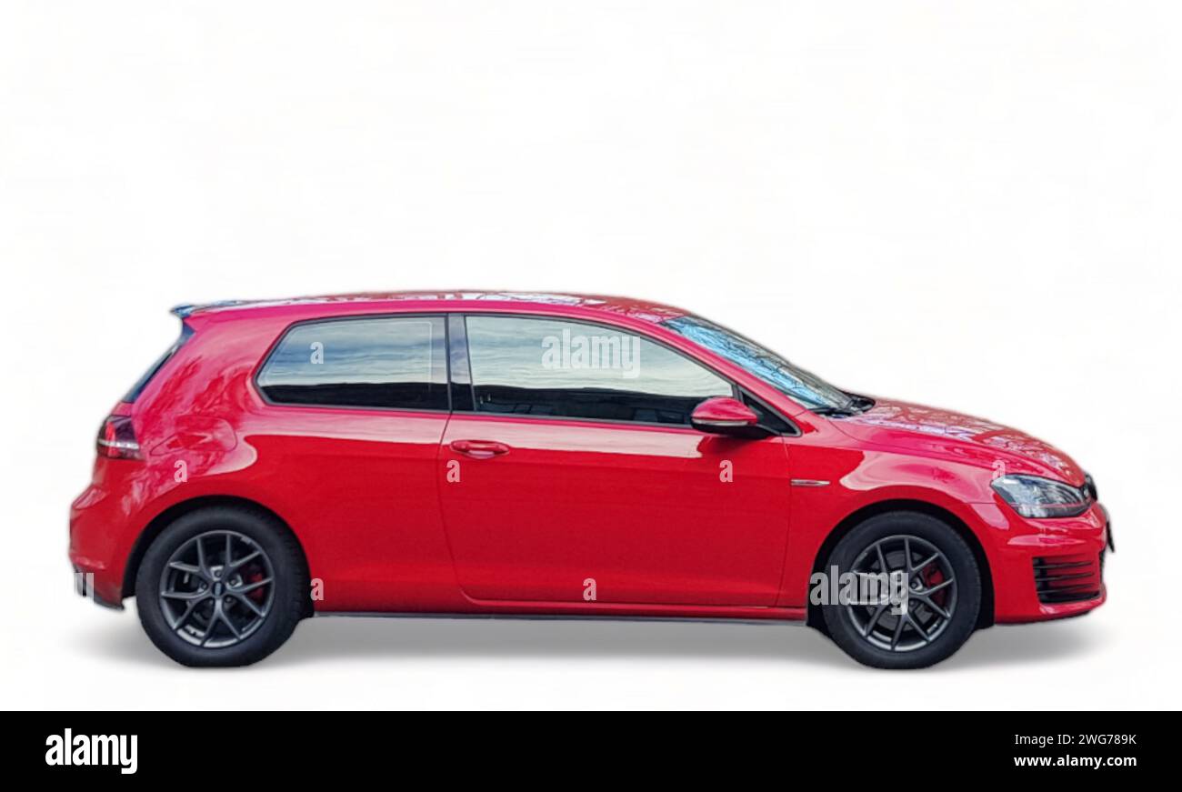Passenger red car in a hatchback body isolated on a white background ...