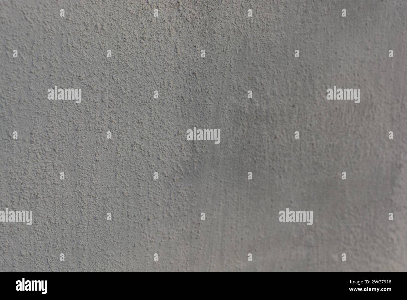 White structural plaster for outdoor use, street wall background with ...