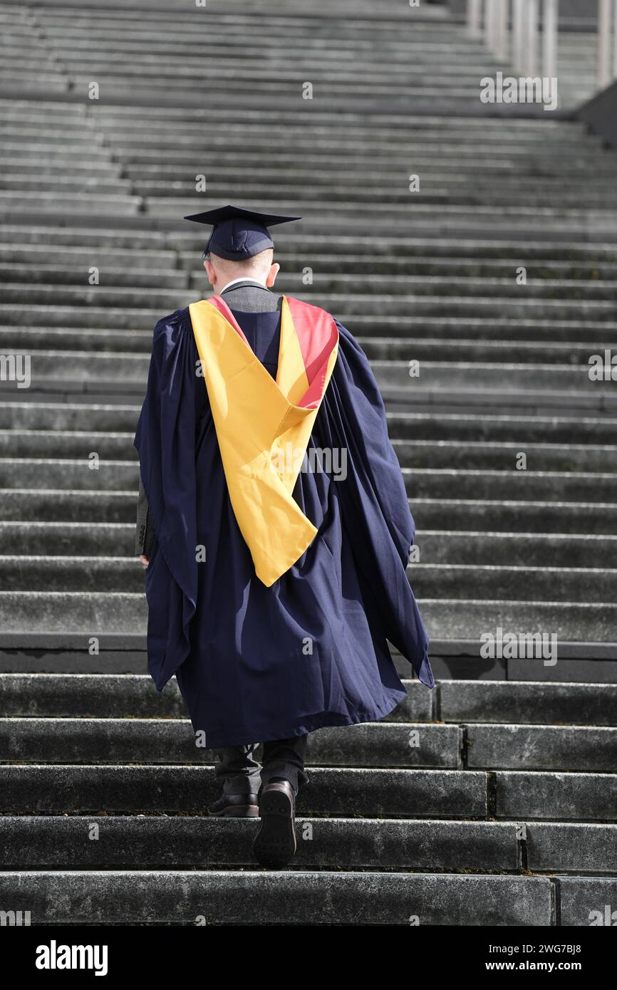 Student Graduating from a British University. Rear view of Graduate ...
