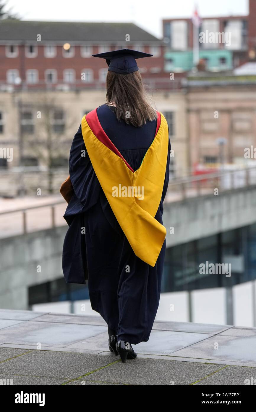 Student Graduating from a British University. Rear view of Graduate ...