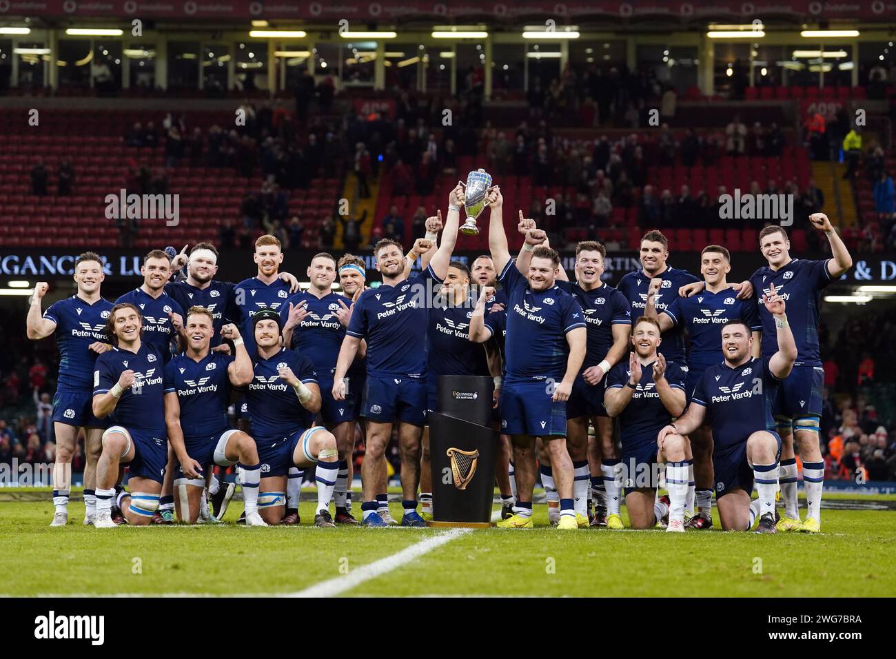 Scotland players lift the Doddie Weir Cup after victory against Wales ...