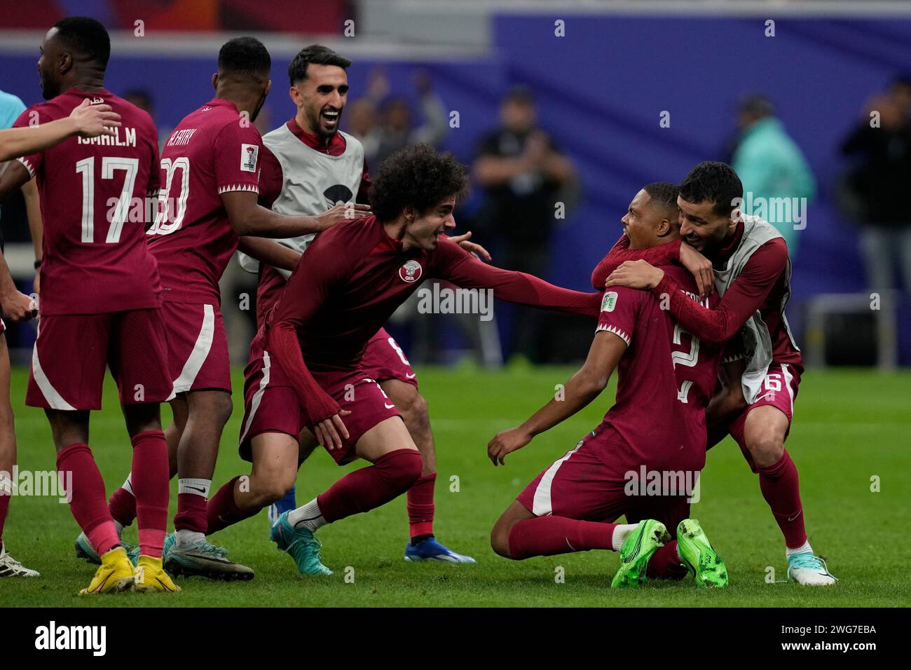 Qatar players celebrate their win during the quarterfinal soccer match ...