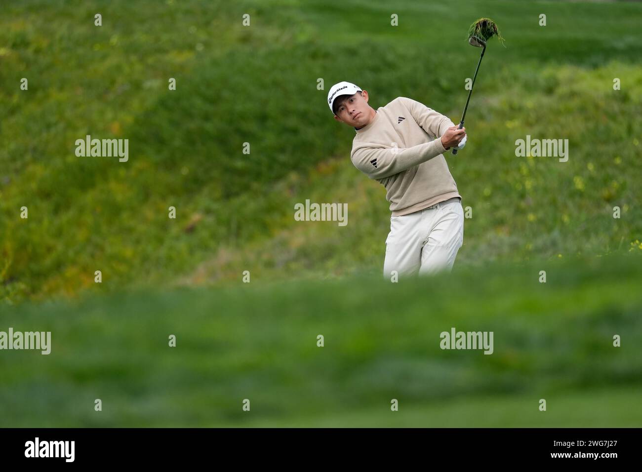 Collin Morikawa hits toward the fifth green at Pebble Beach Golf Links ...