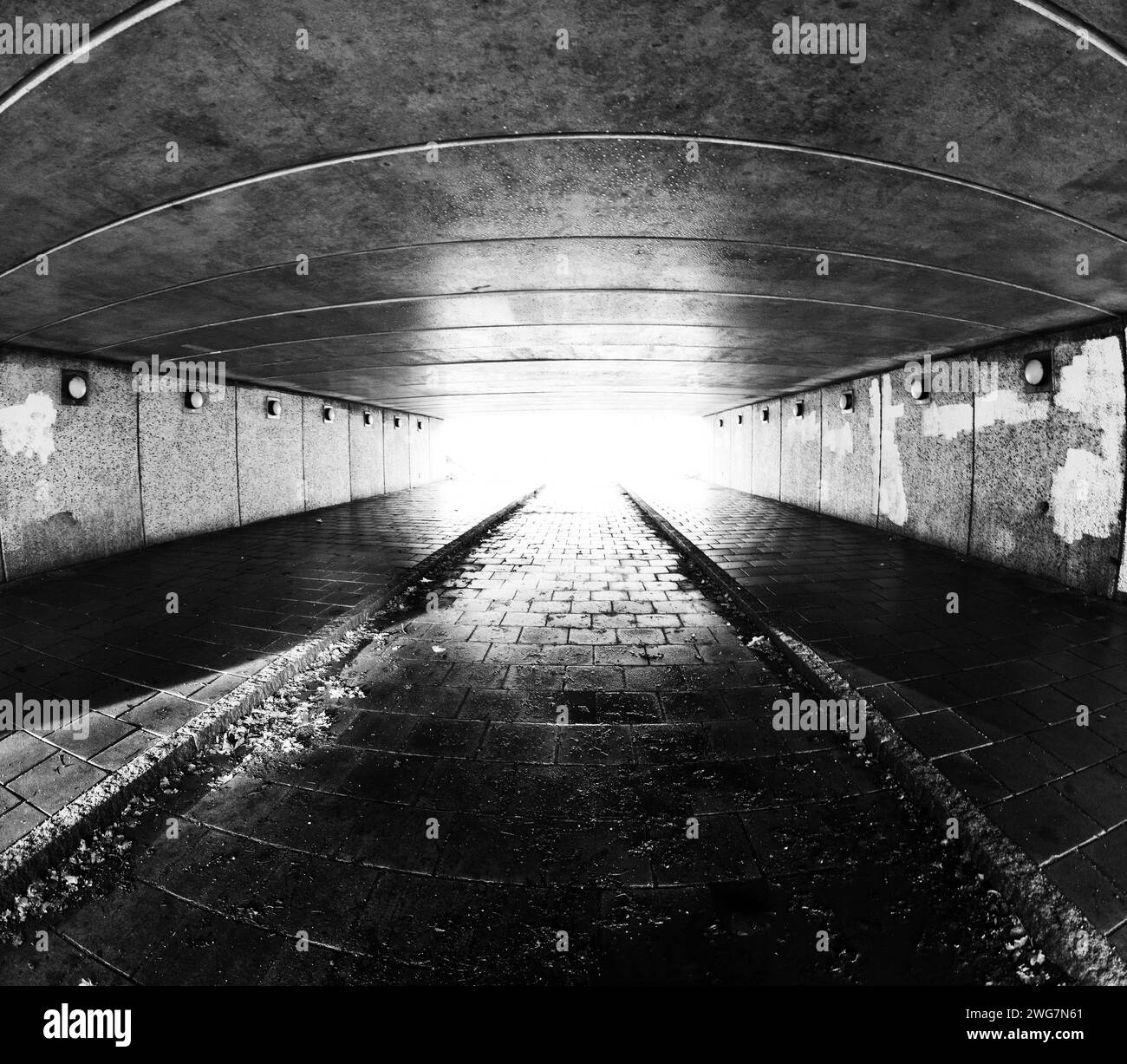Backdrop of light at end of tunnel Black and White Stock Photos & Images - Alamy