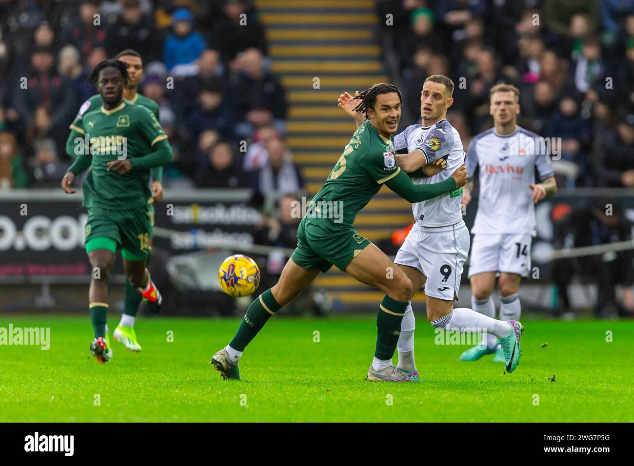 Swansea, UK. 03rd Feb, 2024. Jerry Yates of Swansea City vies for ...