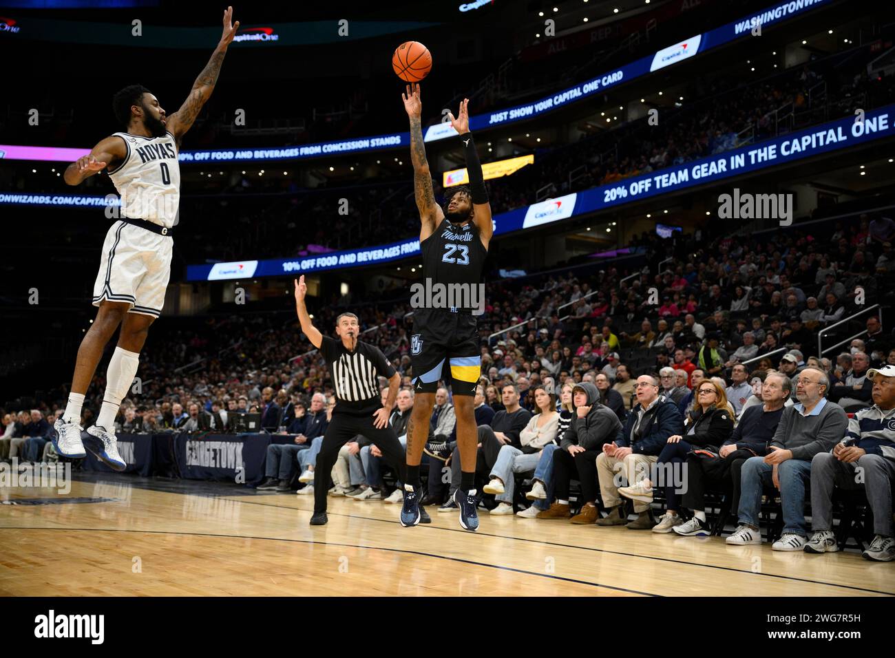 Marquette forward David Joplin (23) shoots over Georgetown guard ...