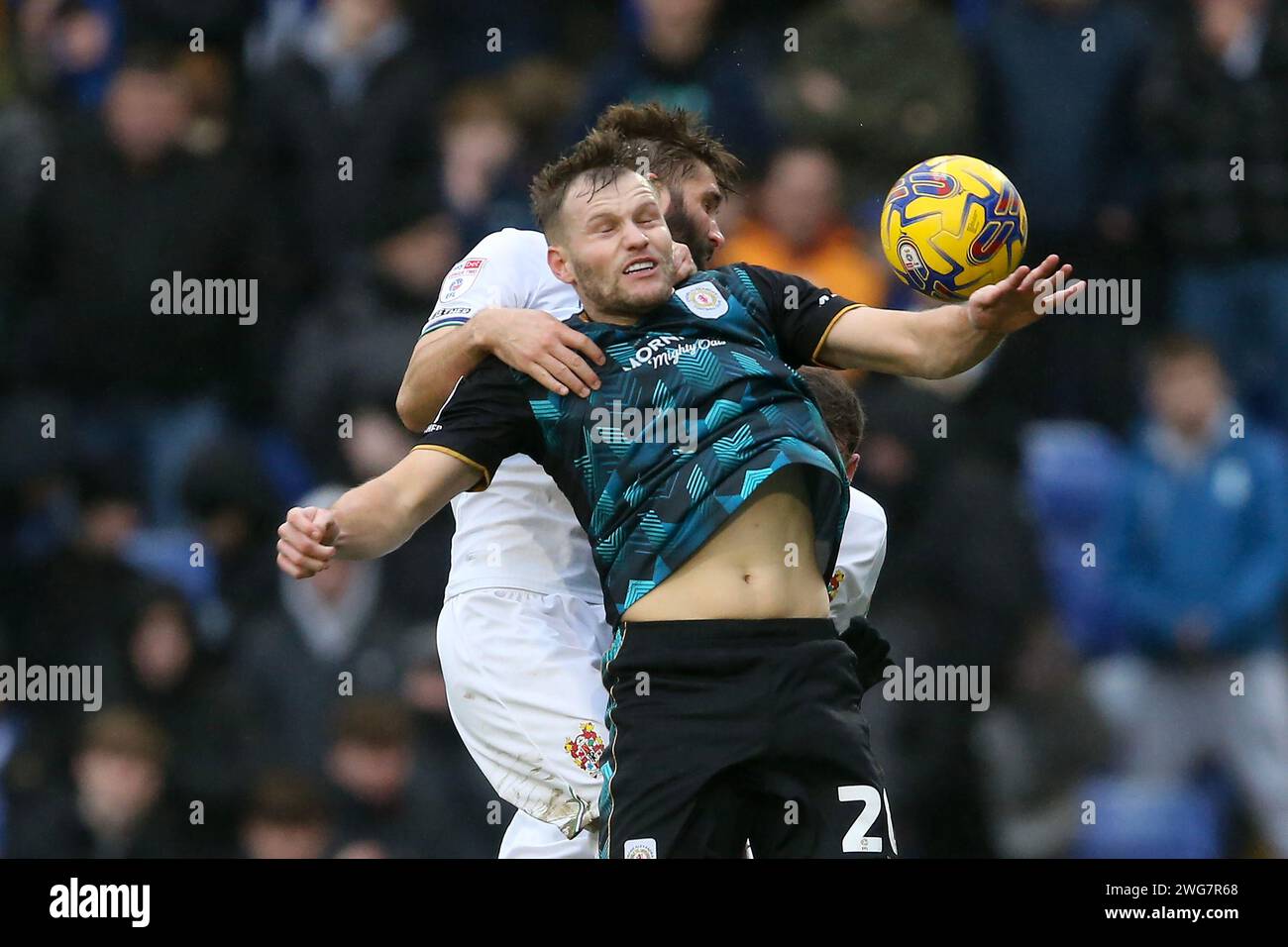 Birkenhead, UK. 03rd Feb, 2024. Elliott Nevitt of Crewe Alexandra and ...