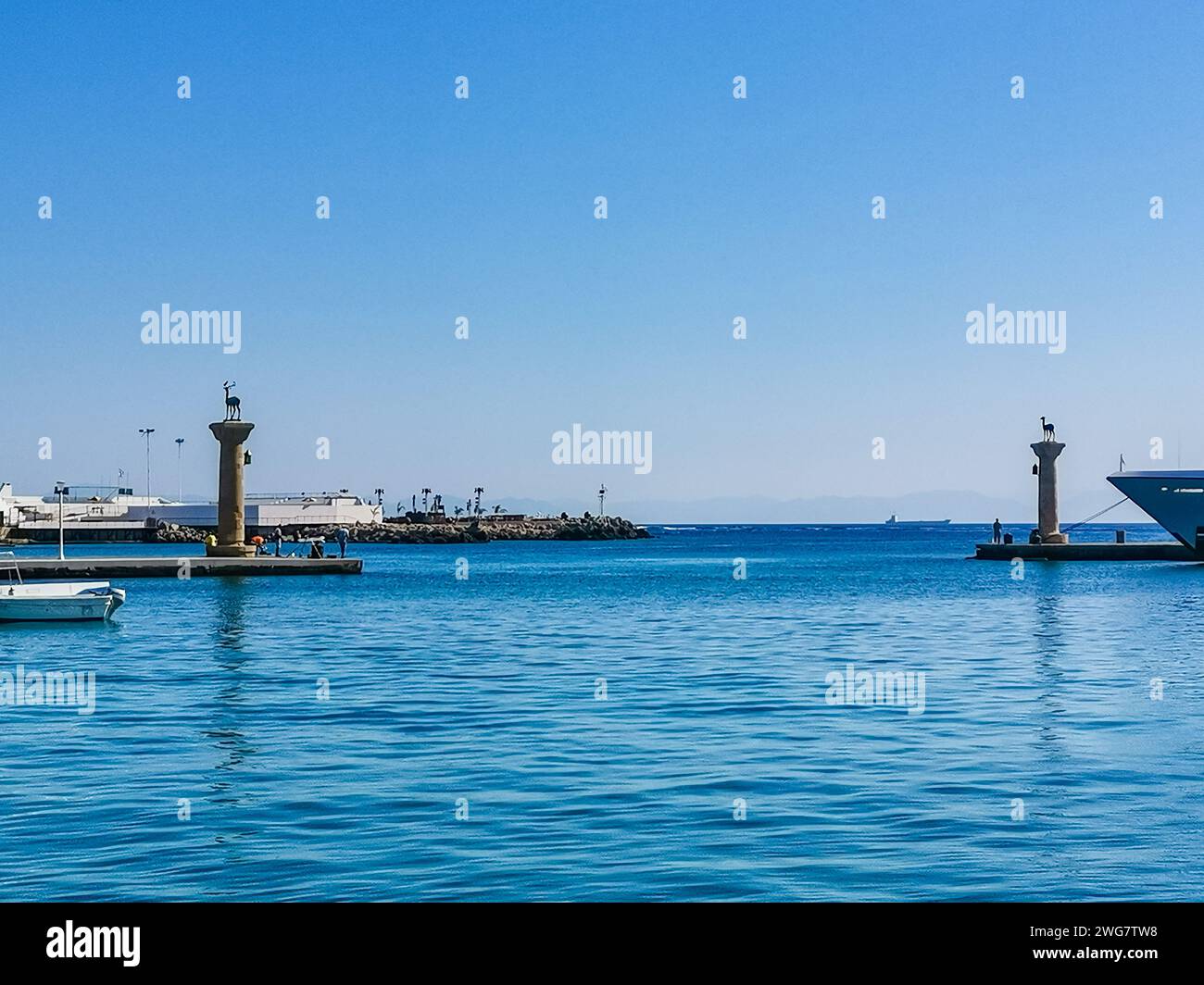 Mandraki port with deers statue, The Colossus was standing. Rhodes ...