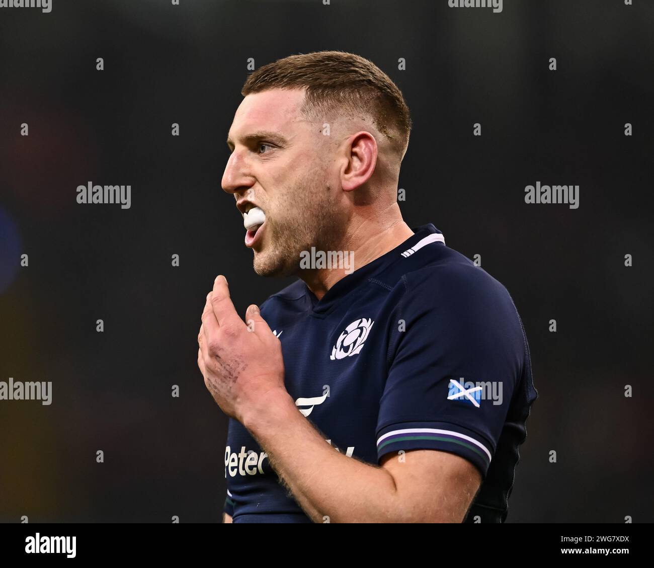 Finn Russell of Scotland puts his gum shield in during the 2024 ...