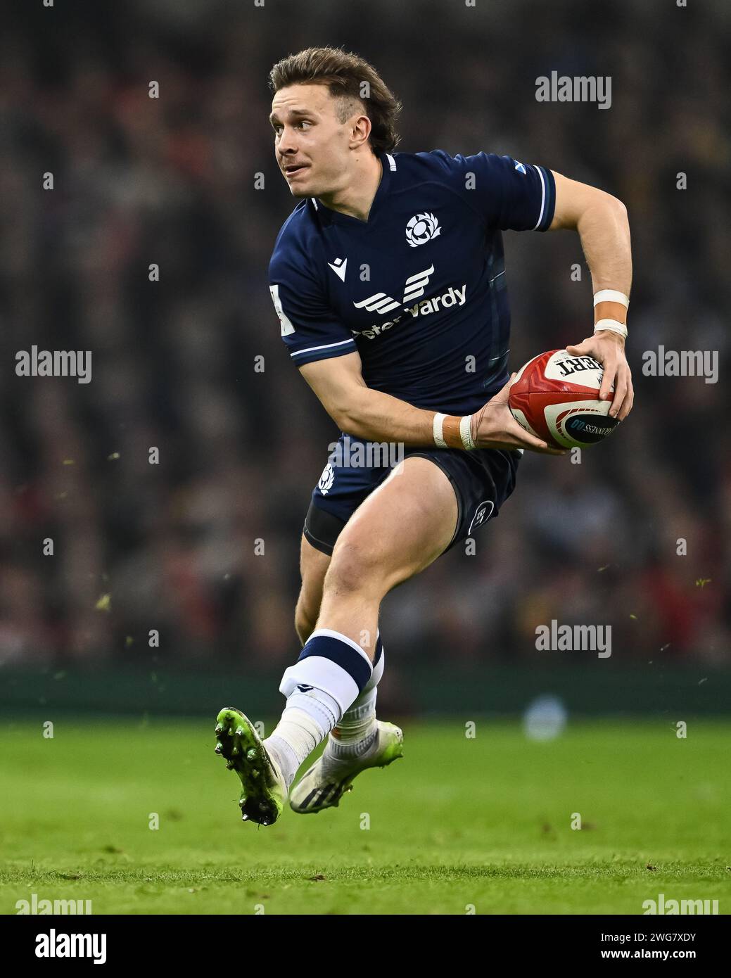 Kyle Rowe of Scotland makes a break during the 2024 Guinness 6 Nations ...