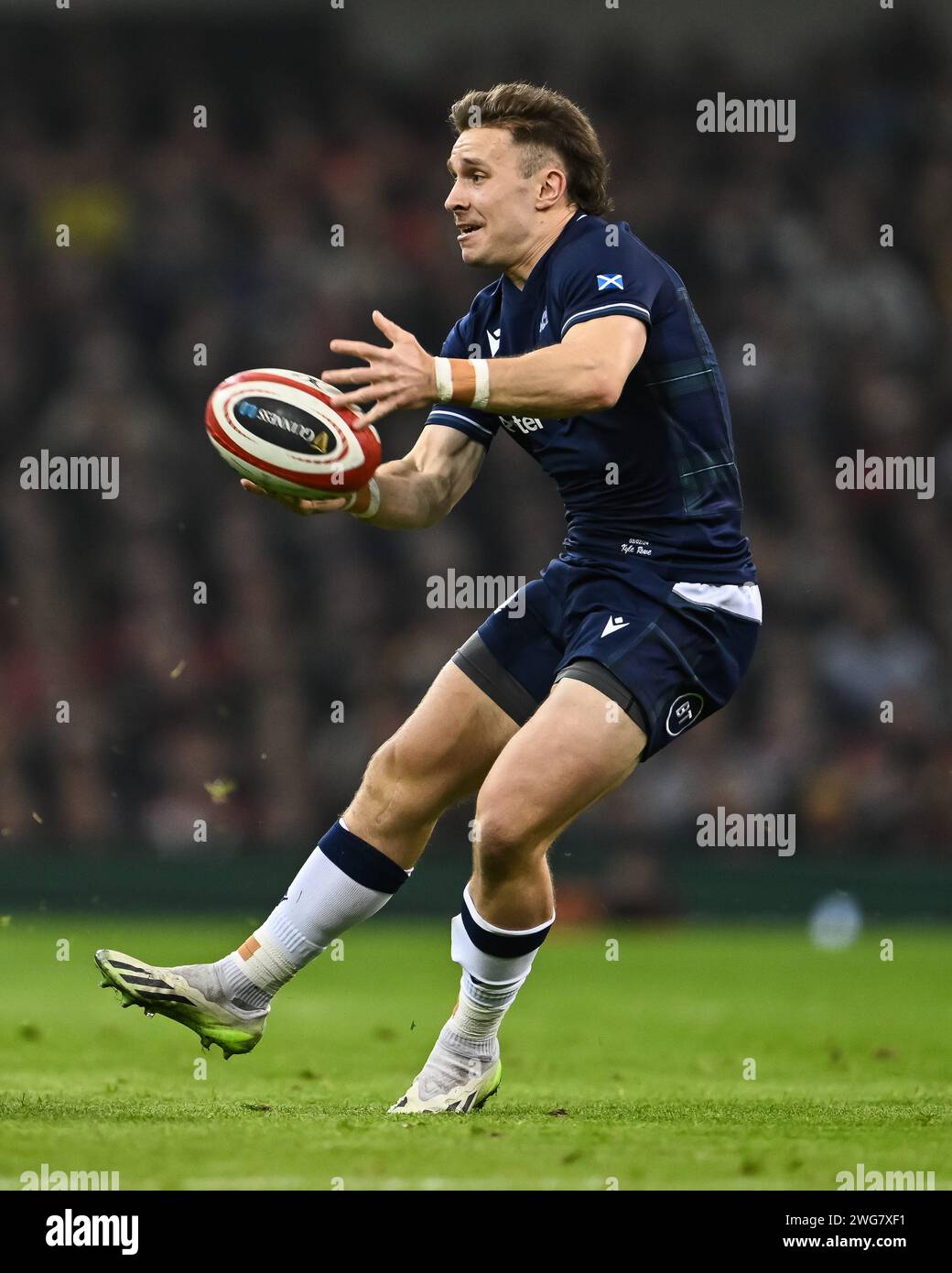 Kyle Rowe of Scotland makes a break during the 2024 Guinness 6 Nations ...