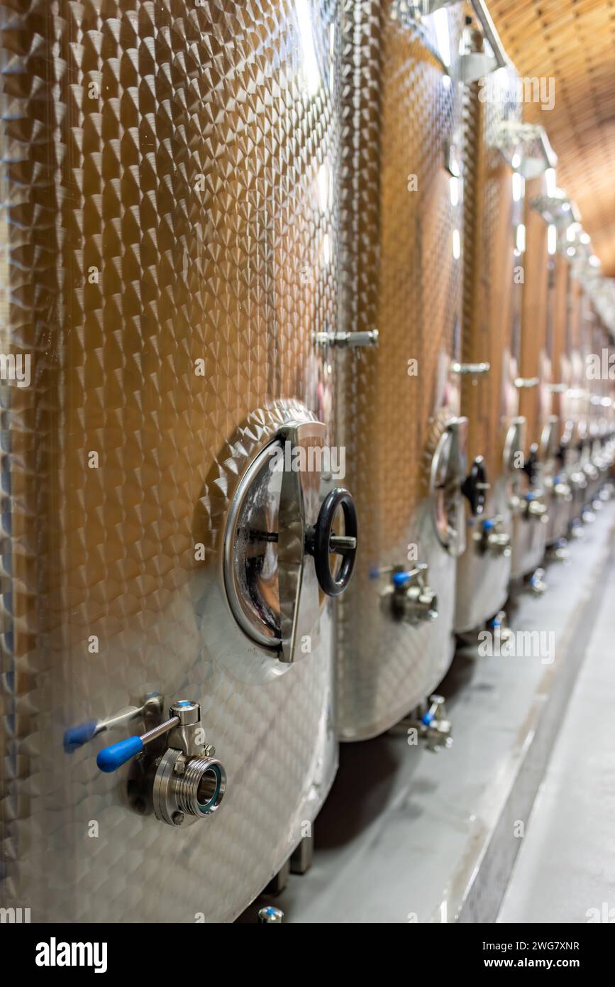 Modern production wine cellar with stainless steel tank, Southern ...