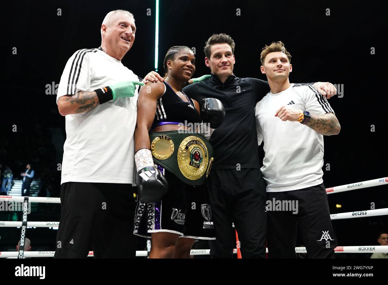 Caroline Dubois (second left) celebrates with their team after victory ...