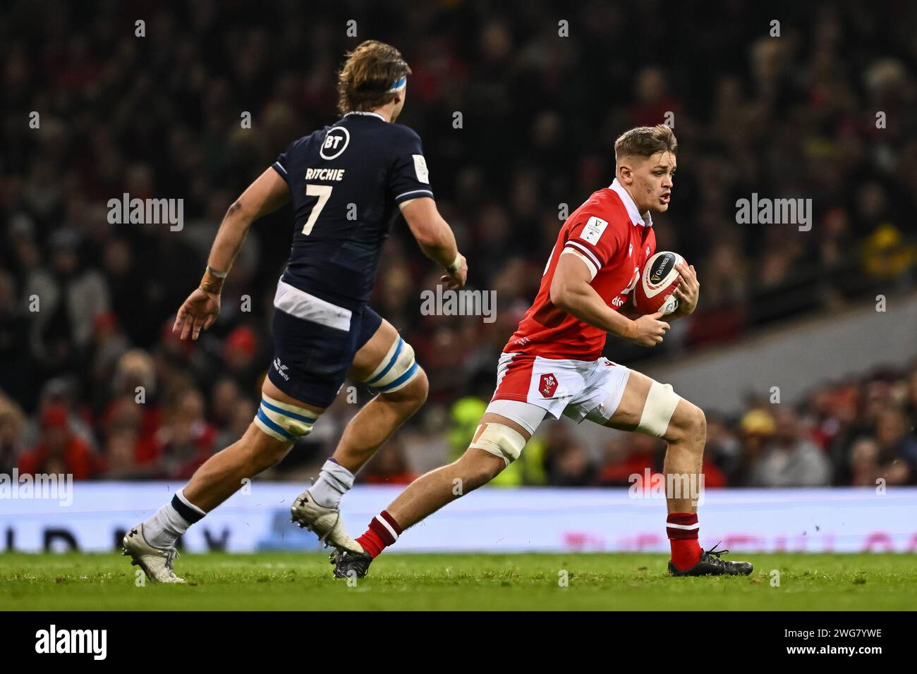 Alex Mann of Wales makes a break during the 2024 Guinness 6 Nations ...