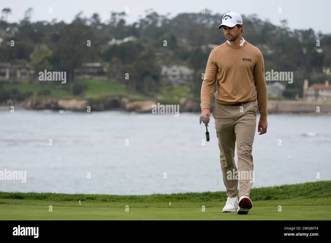 Thomas Detry walks on the seventh green at Pebble Beach Golf Links ...