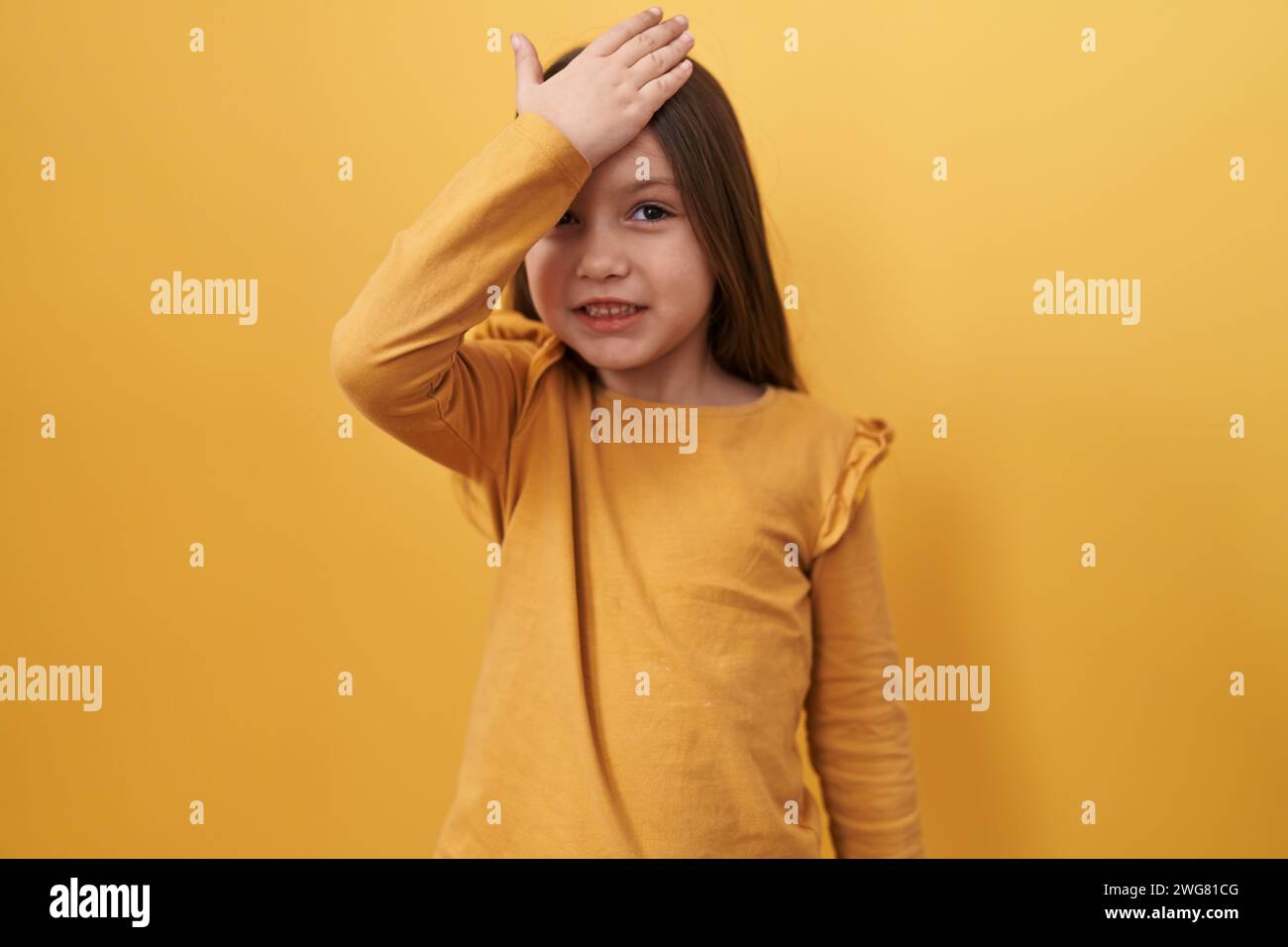 Surprised adorable hispanic girl, forgot crucial error, hand on head in ...