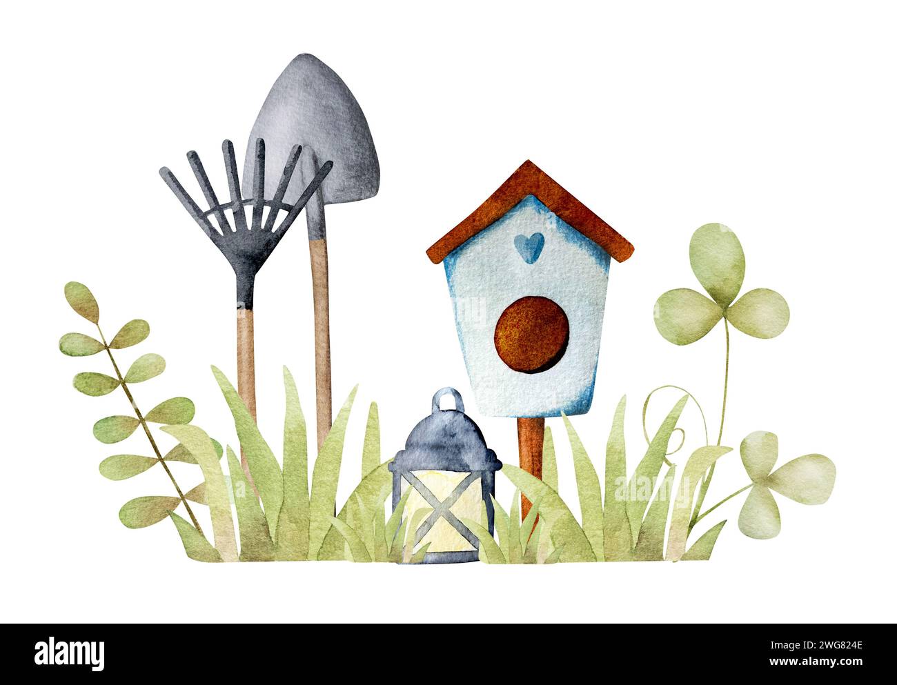 Cute bird house with garden shovel and chopper in green grass ...