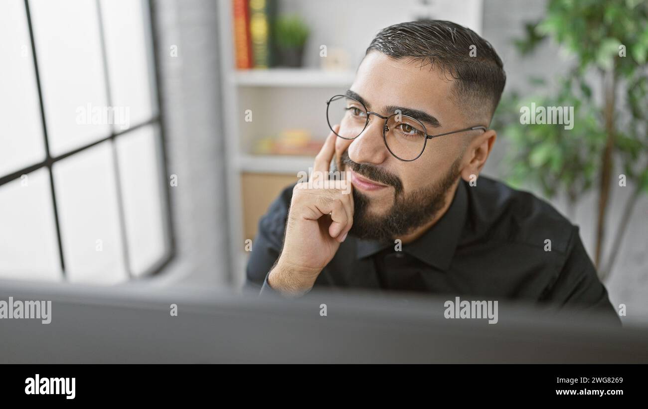 Handsome Bearded Man Wearing Glasses Posing Thoughtfully In A Modern