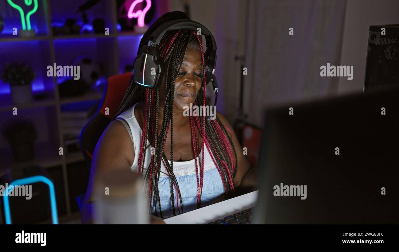 Passionate african american woman streamer bringing virtual magic into ...