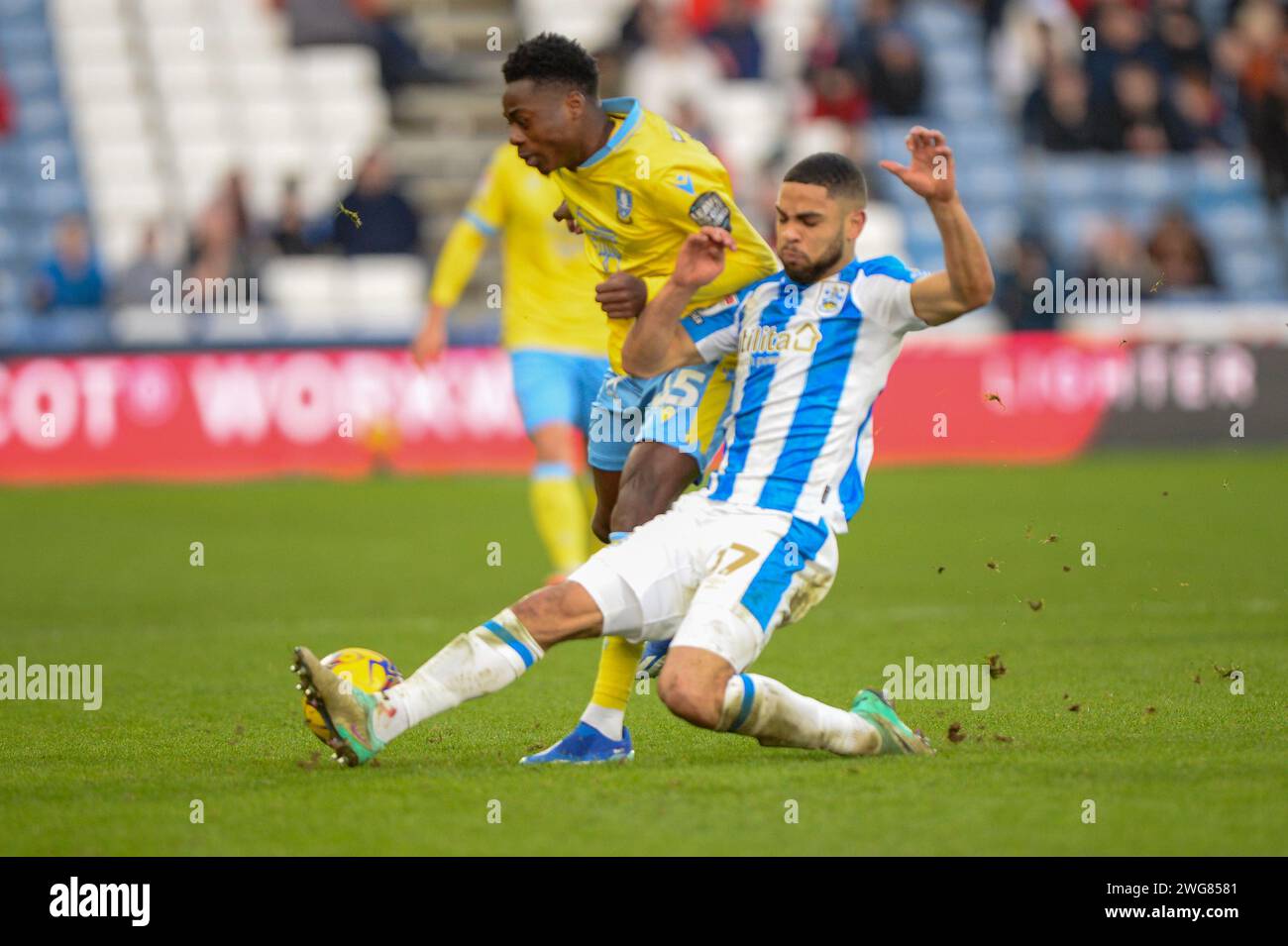 Anthony Musaba of Sheffield Wednesday is under pressure from Brodie ...