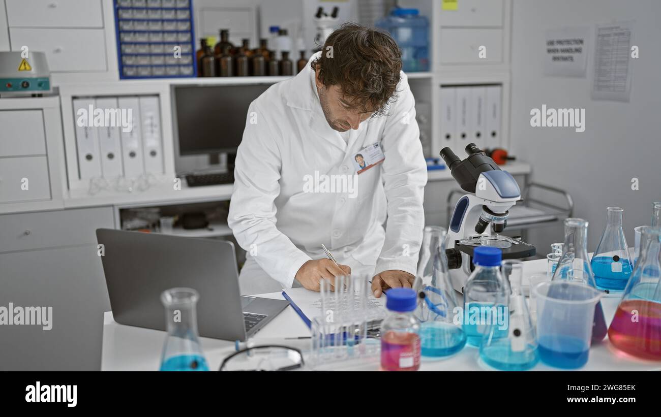 Laptop chemical glassware microscope hi-res stock photography and ...