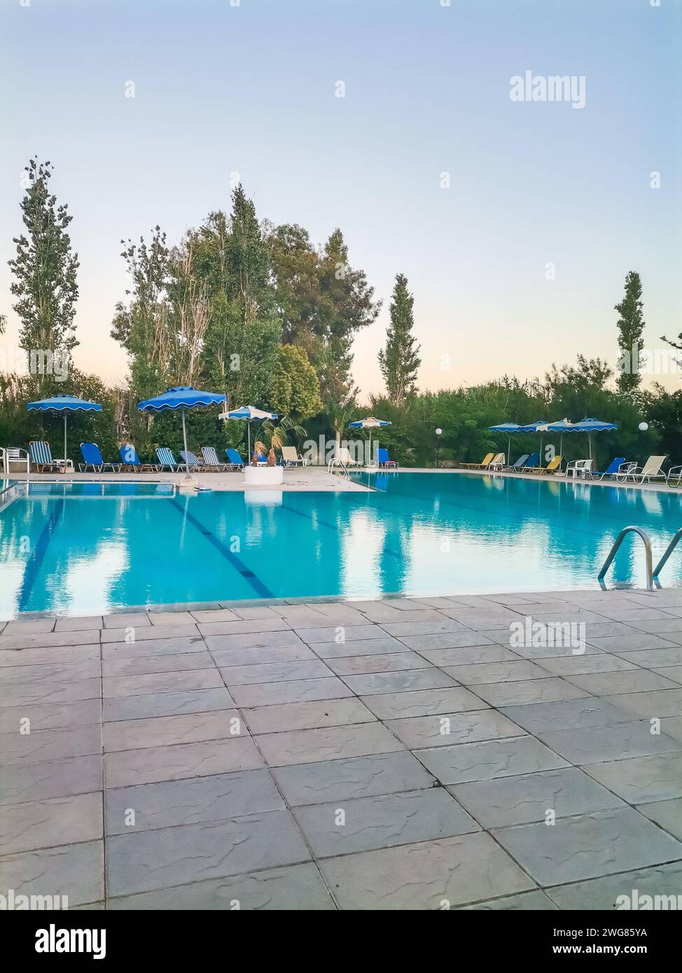 Luxury swimming pools in a modern hotel sunny morning Greece Rhodos ...