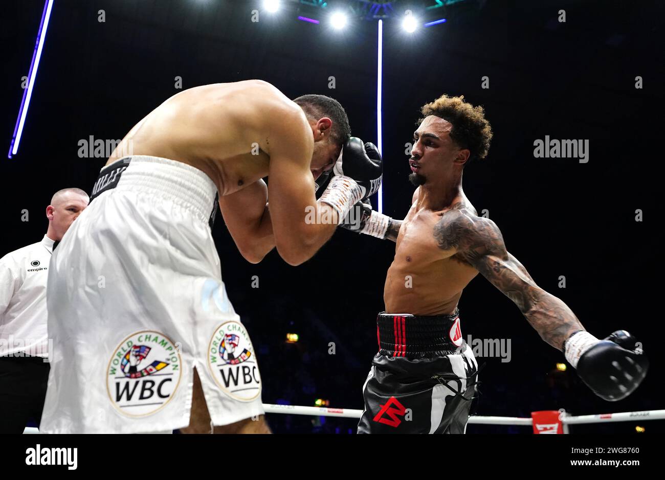 Ben Whittaker (right) in action against Khalid Graidia in the light ...